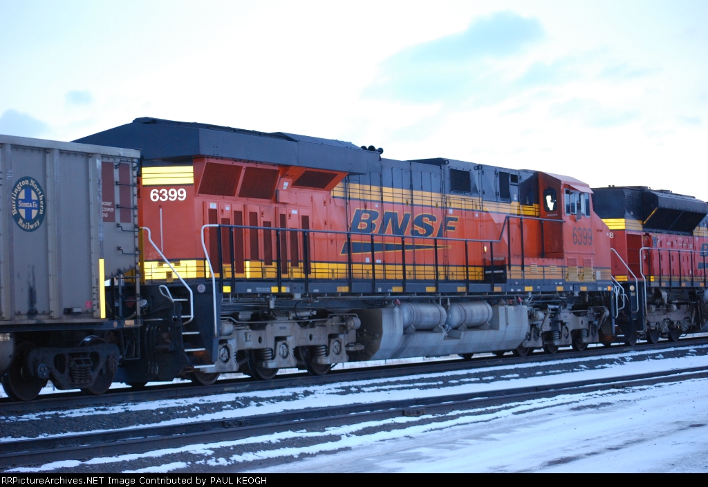 BNSF 6399 rolls by me with BNSF 7298 as the lead unit pulling this eastbound mty coal train.